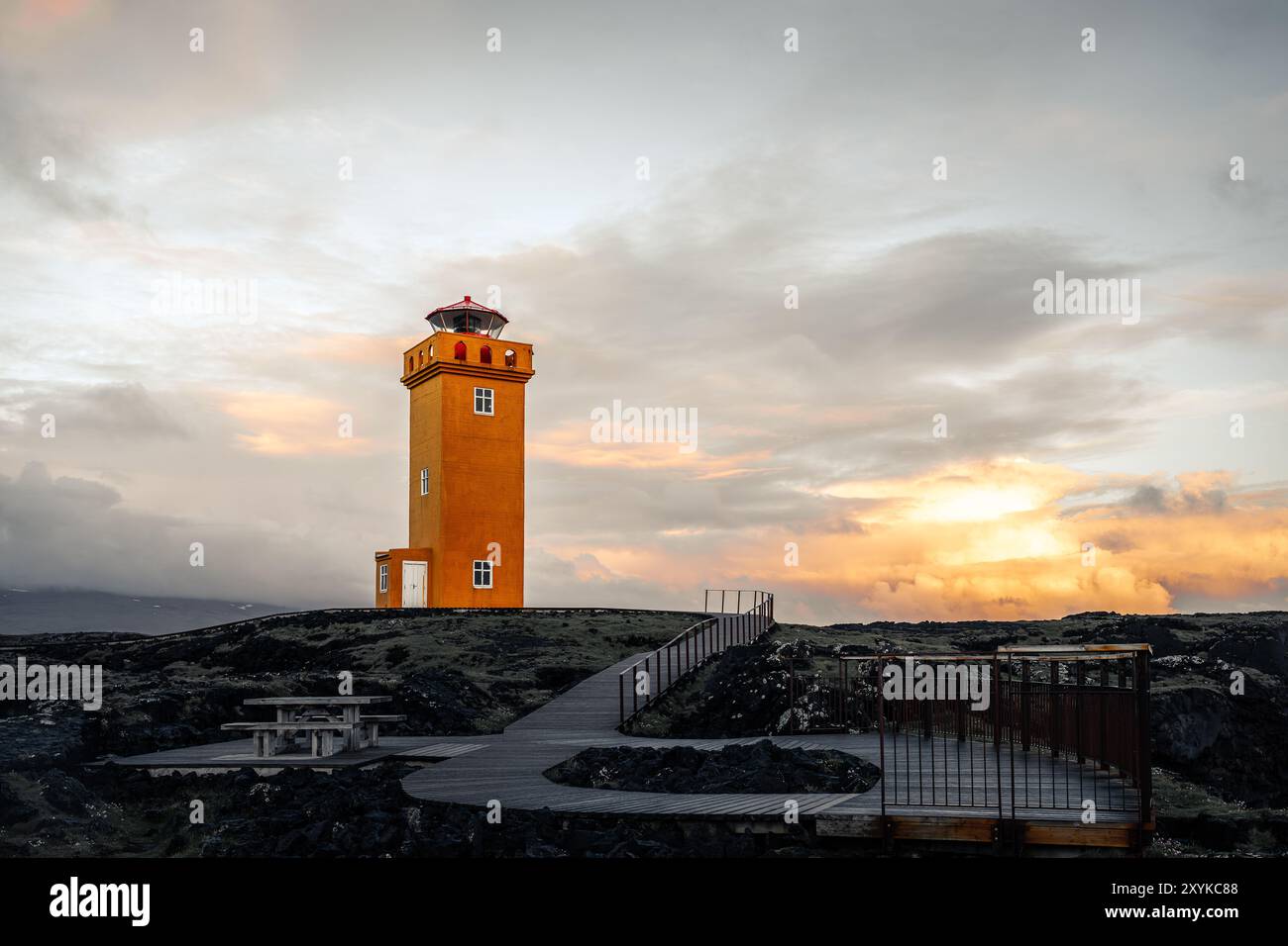 view of the recreation area next to the orange lighthouse in Iceland ...
