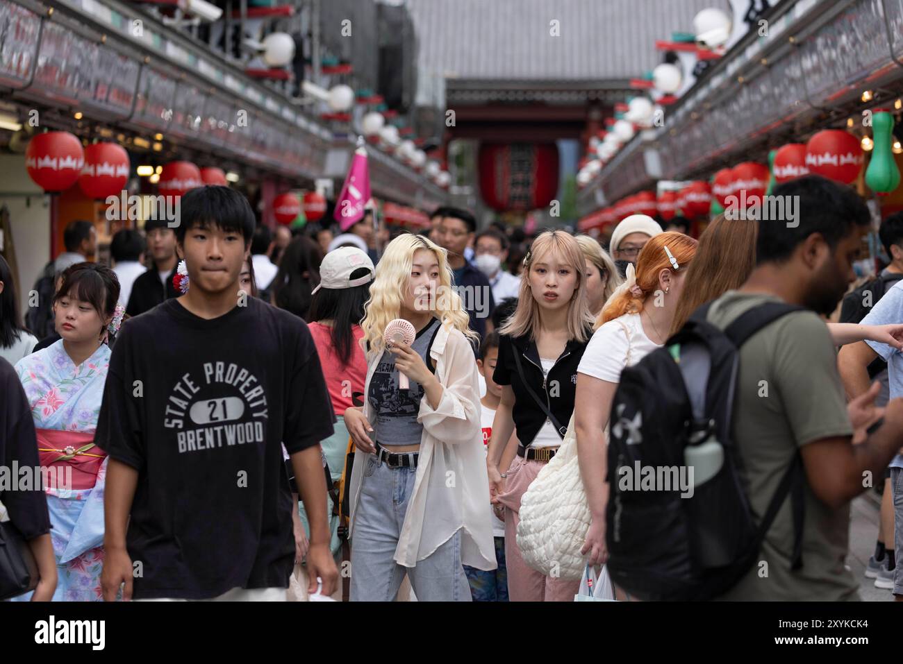 Tokyo, Japan. 29th Aug, 2024. Asian tourists walk inside Senso-ji ...