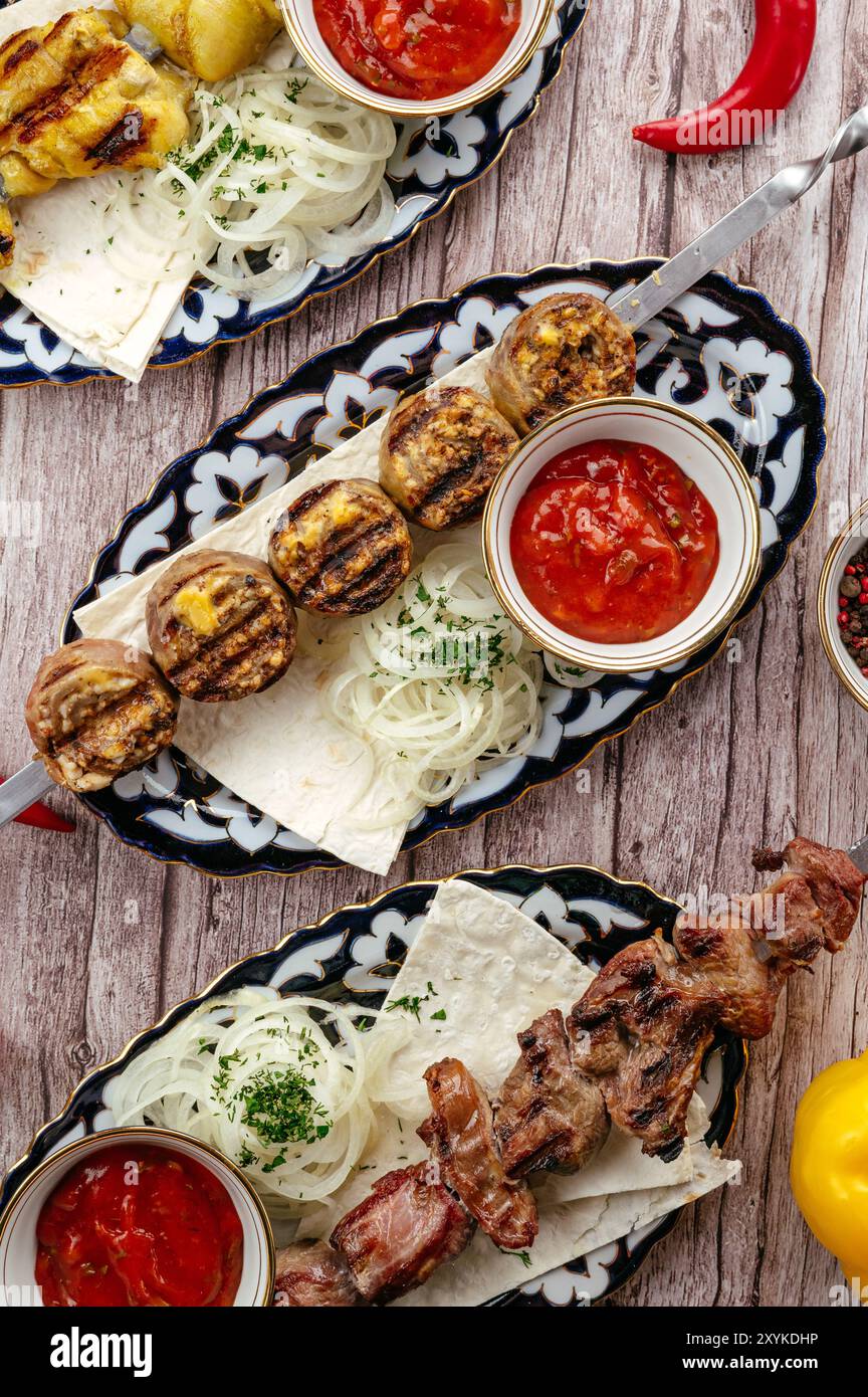Barbecue on a skewer. Uzbek cuisine Stock Photo - Alamy