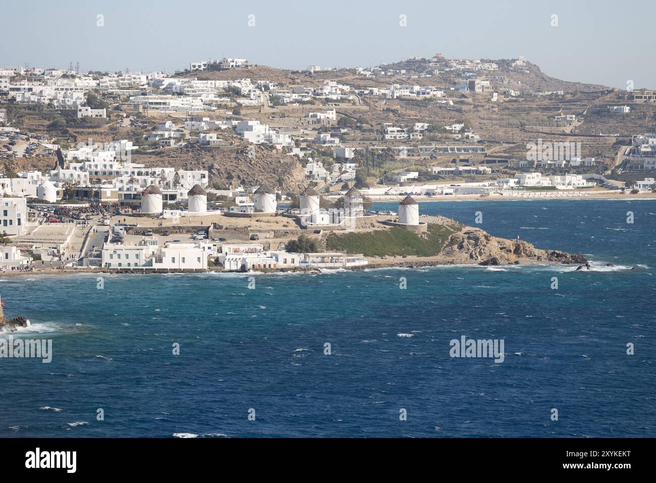 Windmills blowing on the windy island of Mykonos, Greece Stock Photo ...