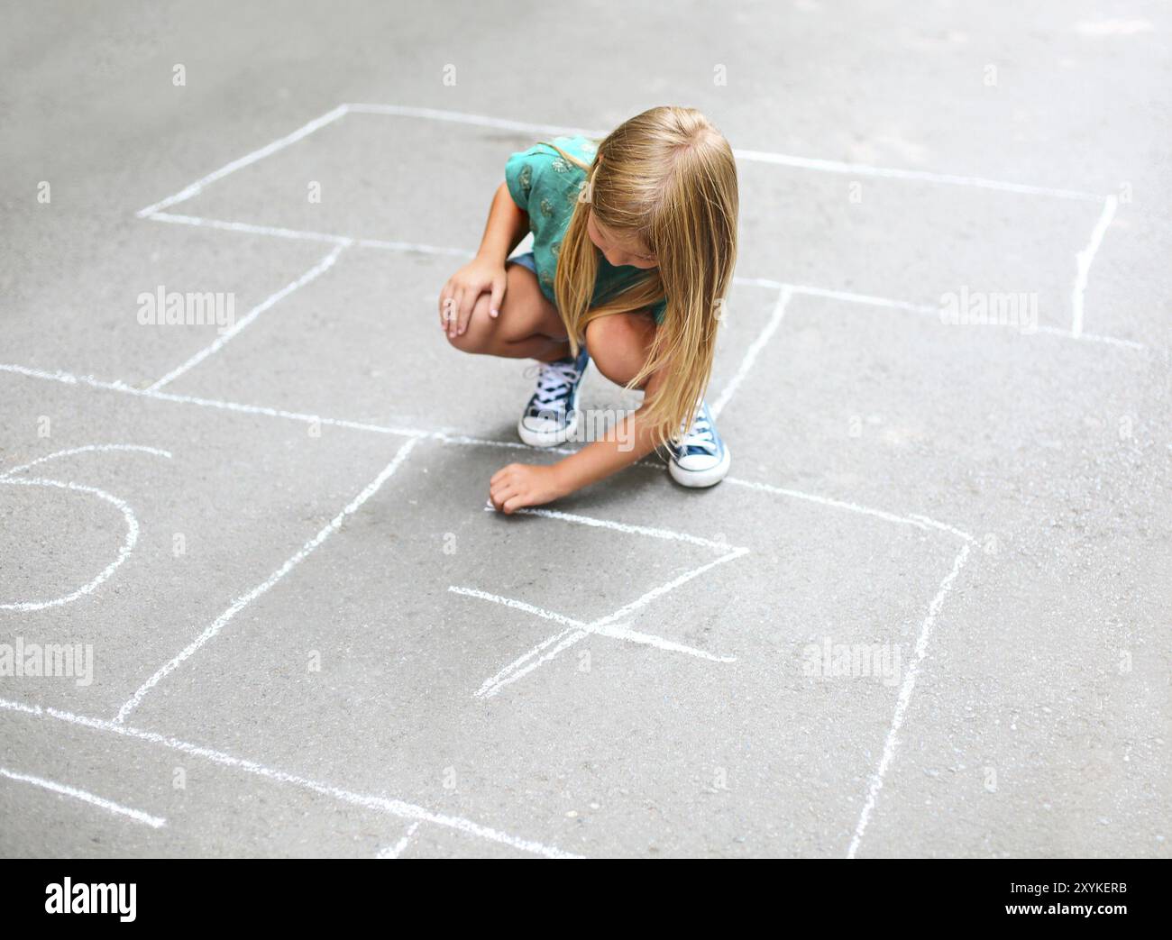 Children playing hopscotch hi-res stock photography and images - Alamy