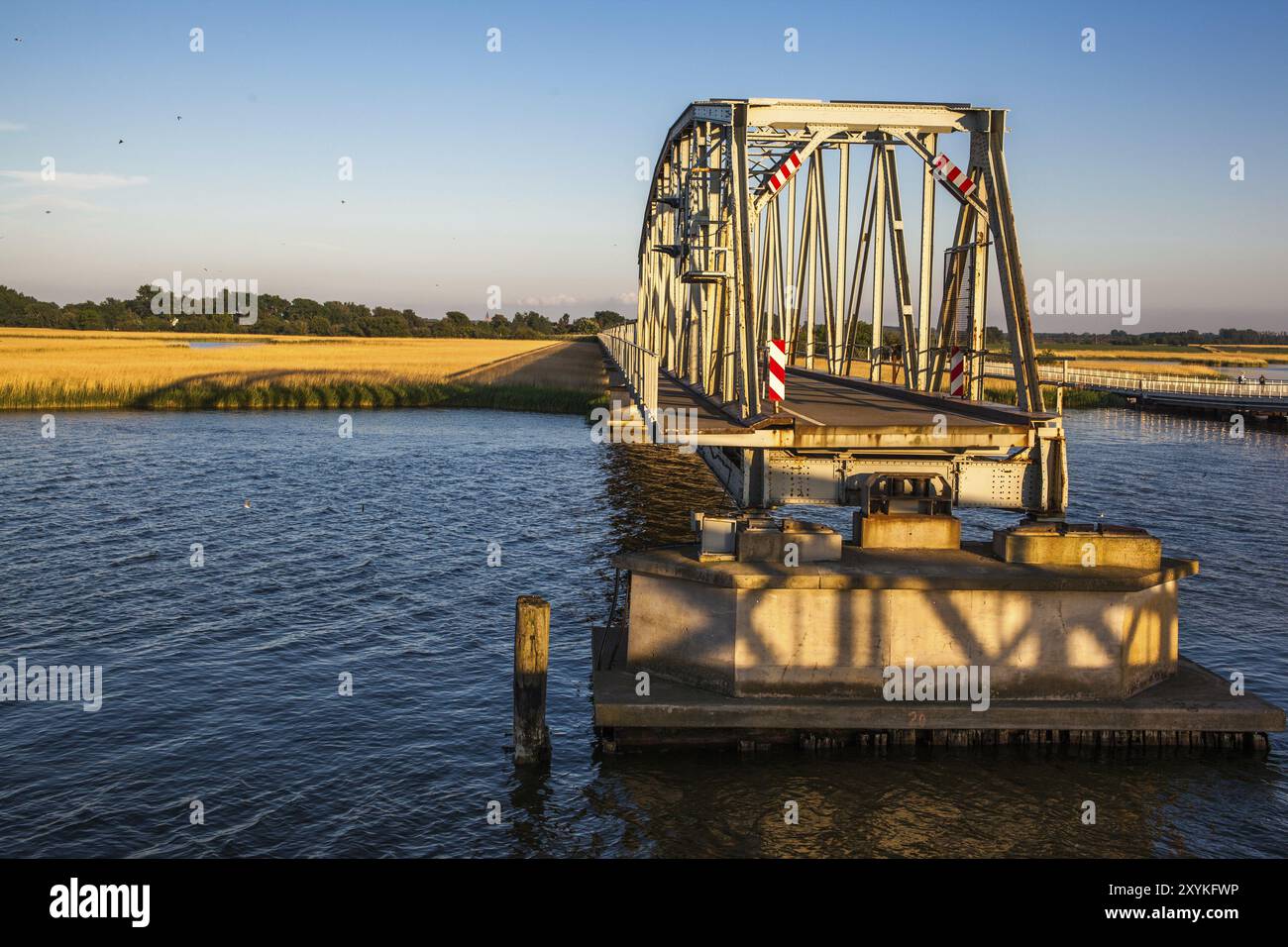 Rusty historic swing bridge that crosses the water Stock Photo - Alamy