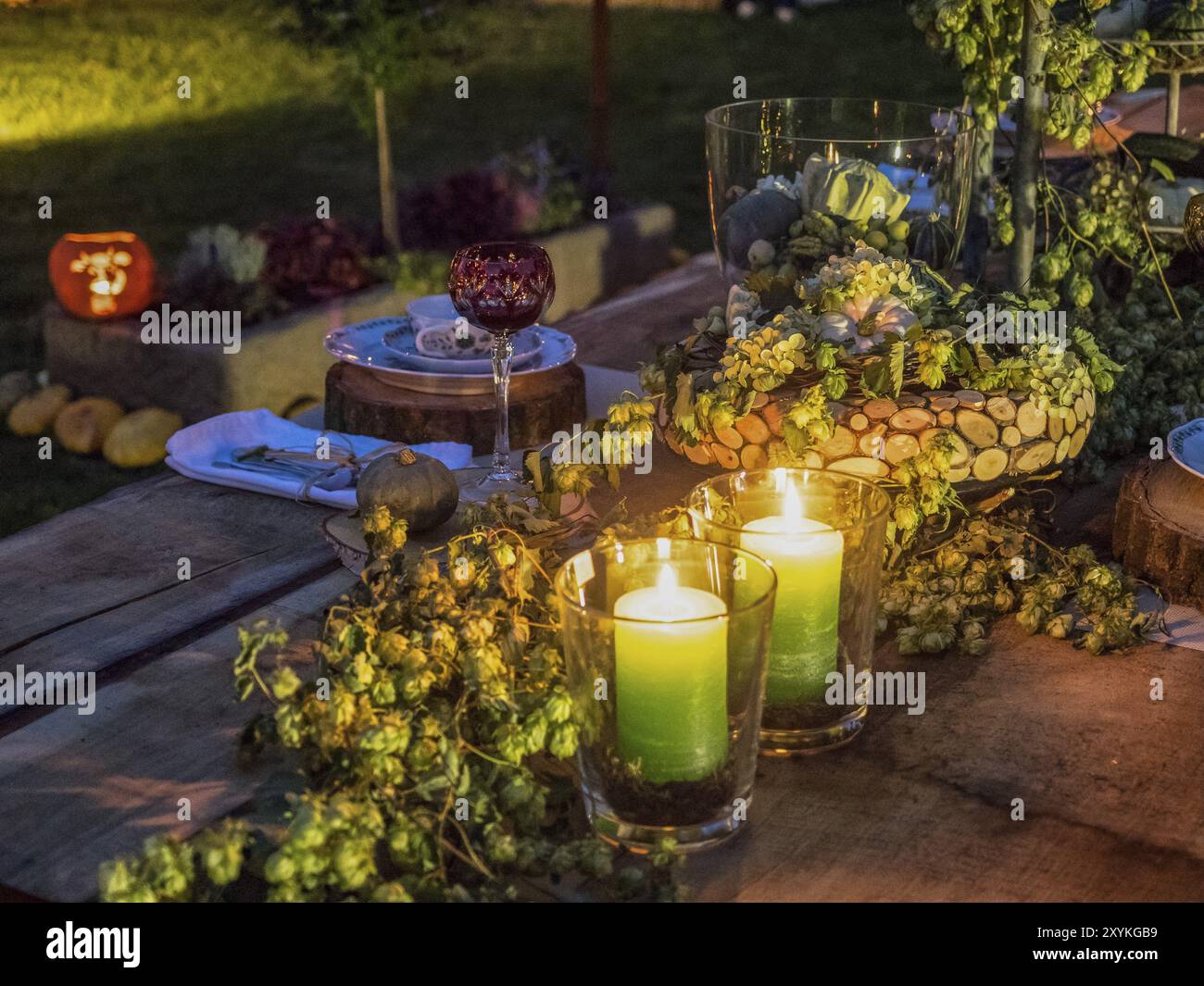 Candle shines on table in hi-res stock photography and images - Alamy