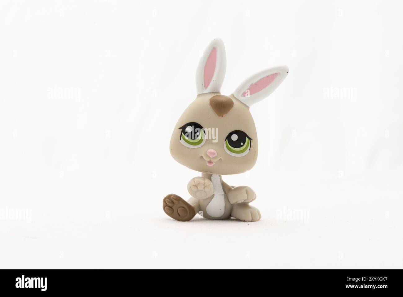 Plastic toy rabbit on white background Stock Photo - Alamy