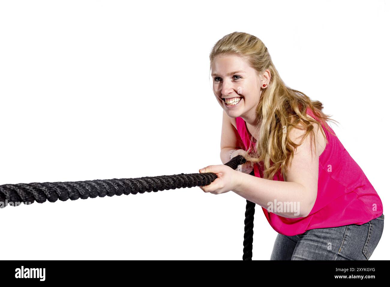 Woman pulling on t shirt hi-res stock photography and images - Alamy