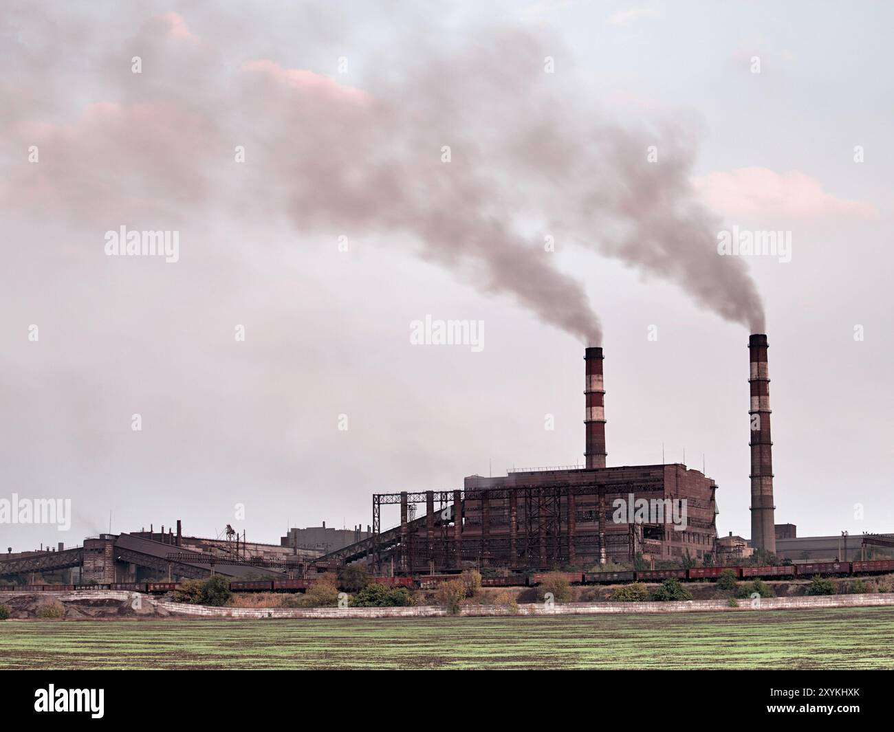 Smoking industrial zone factory chimneys hi-res stock photography and ...
