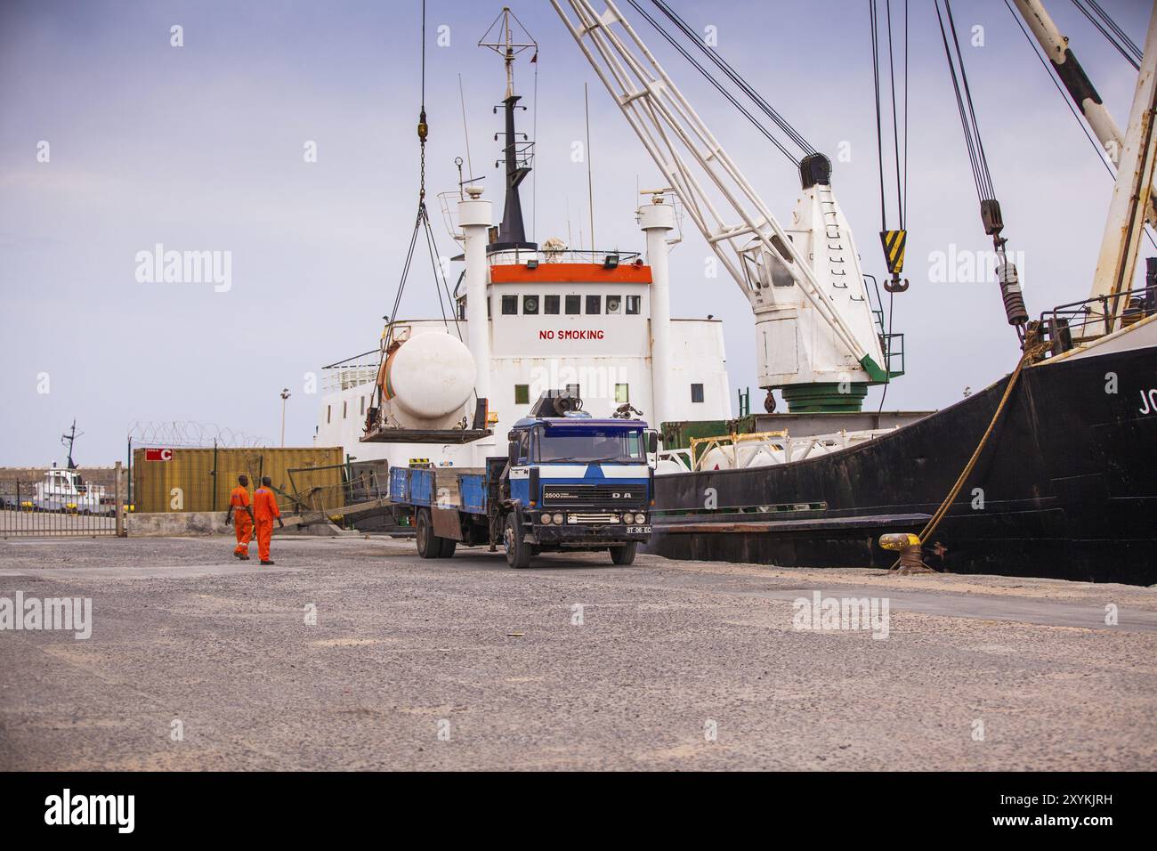 Tank is loaded from a lorry onto a ferry Stock Photo - Alamy
