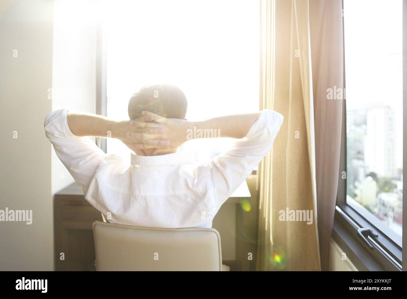 Guy relaxing at hotel hi-res stock photography and images - Alamy