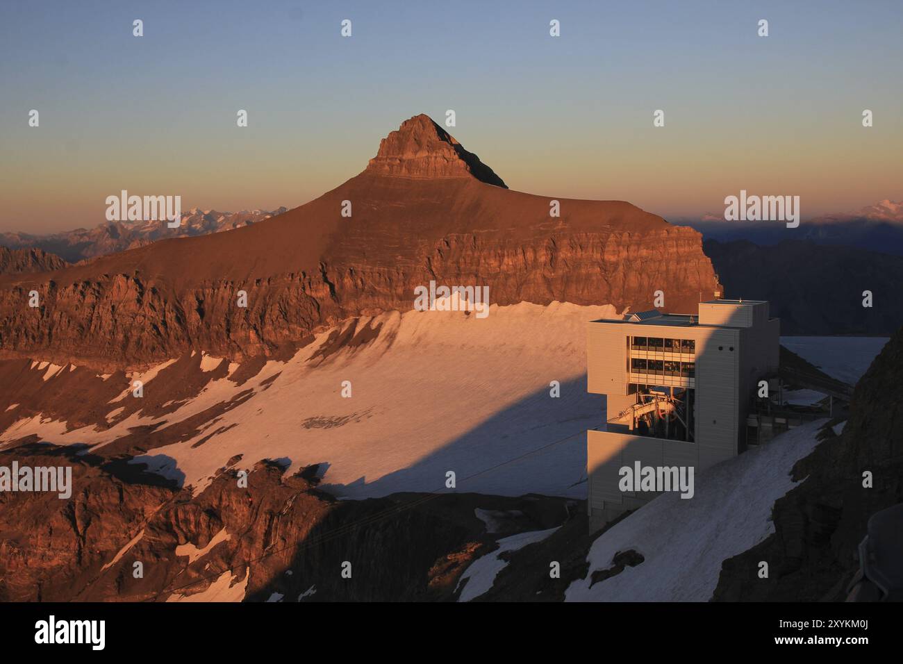 Mt Oldenhorn at sunset. Summit station of the Glacier de Diablerets ...