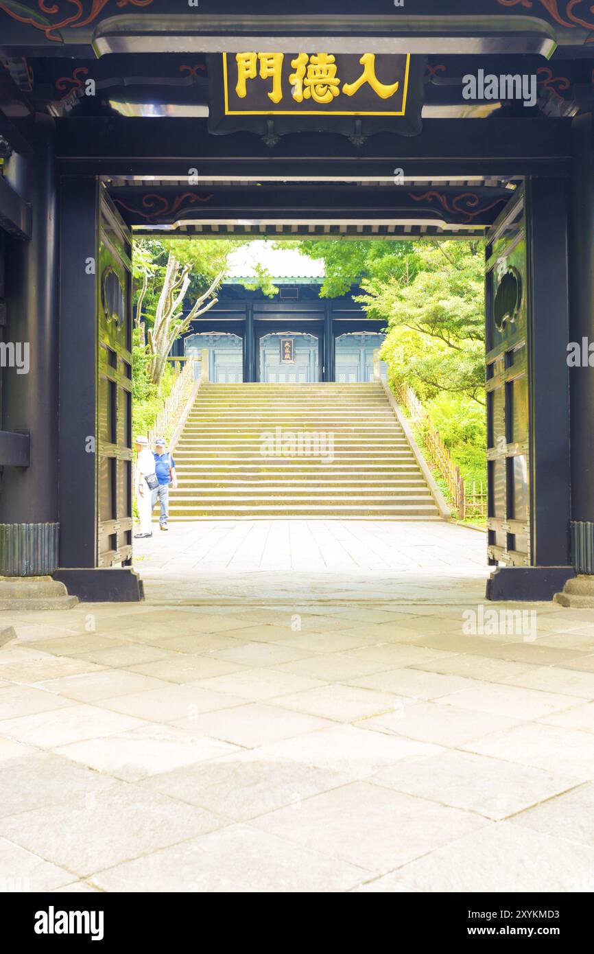 Stairs seen through open entrance doors to historic Yushima Seido, a ...