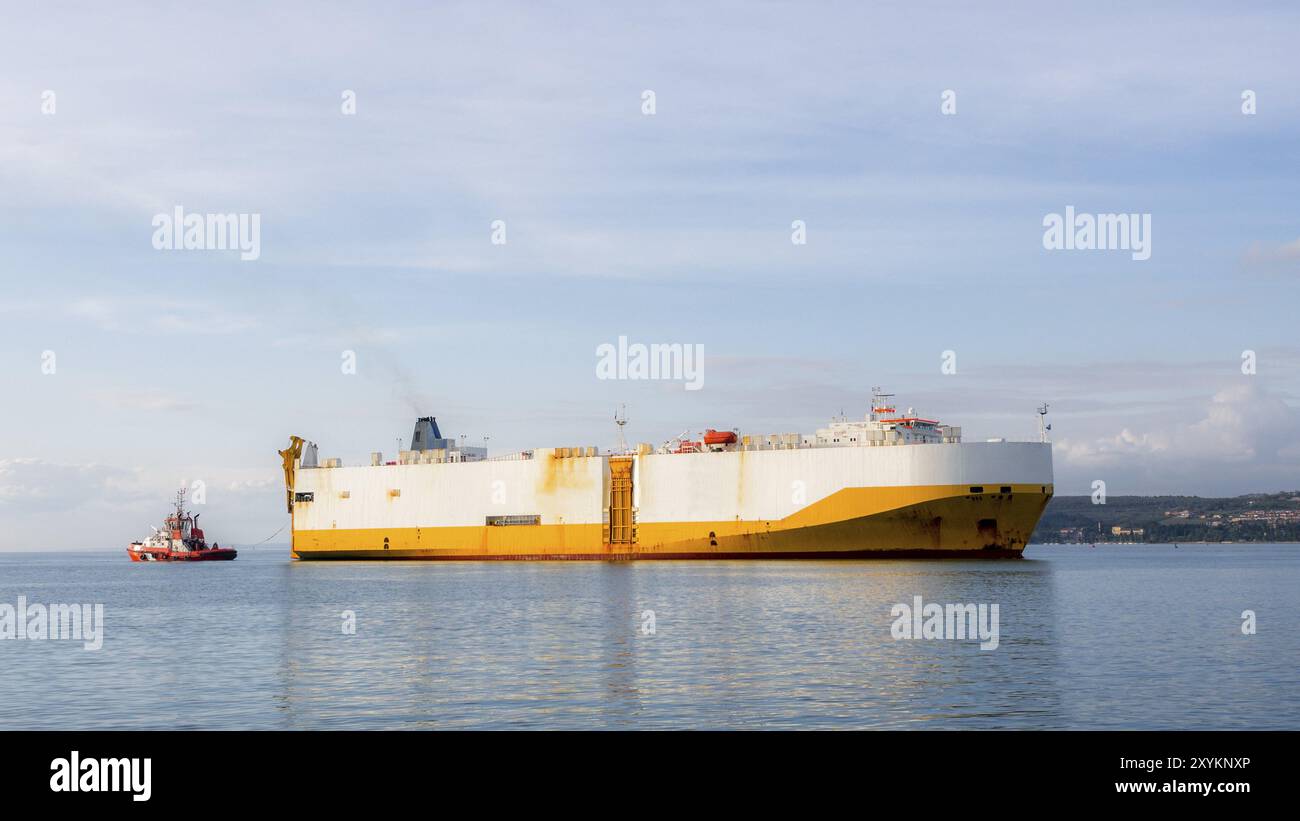 Container ship tossed by tossing boat Stock Photo - Alamy