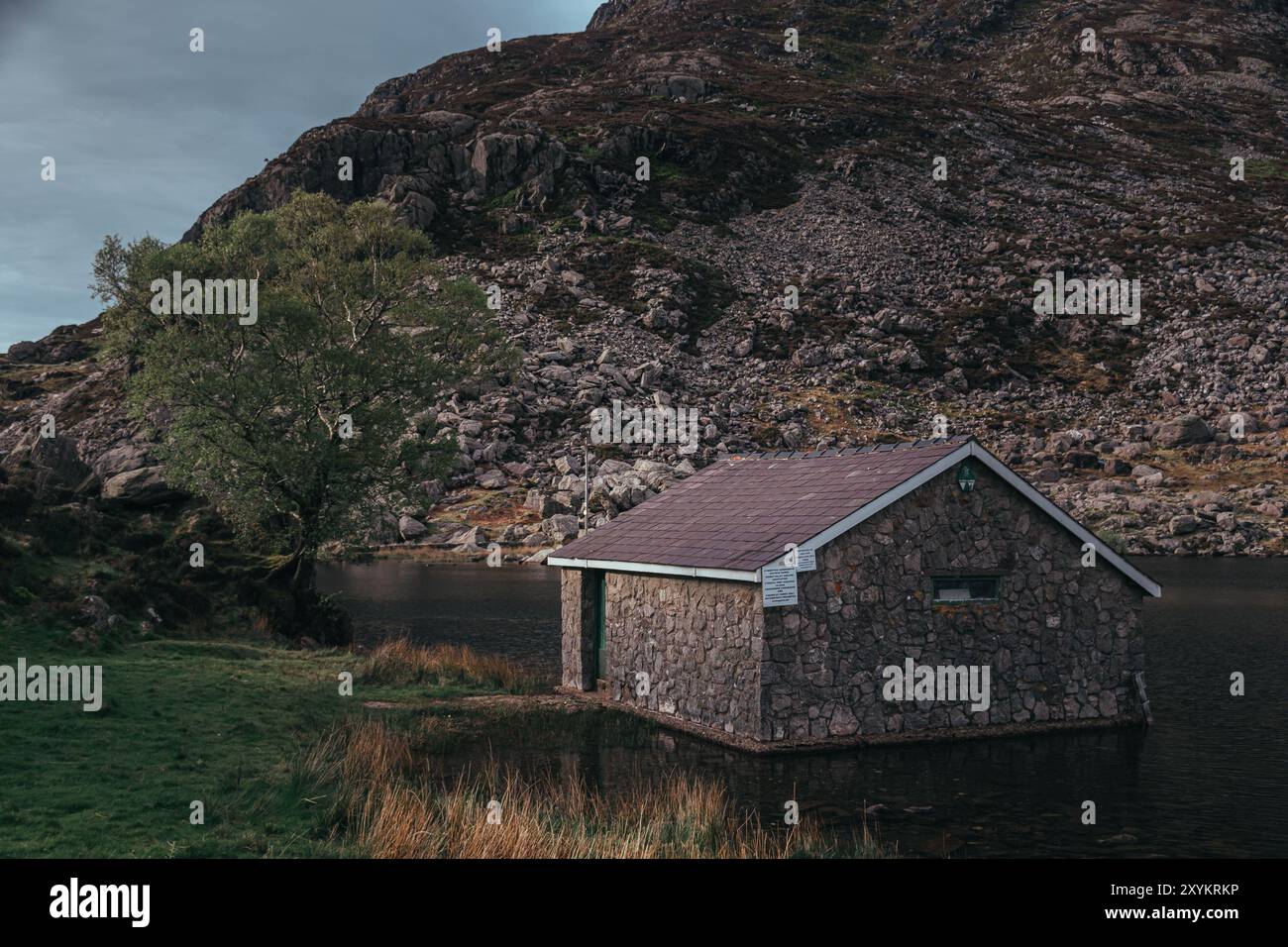 Stone hut on a river in the Welsh mountains Stock Photo - Alamy