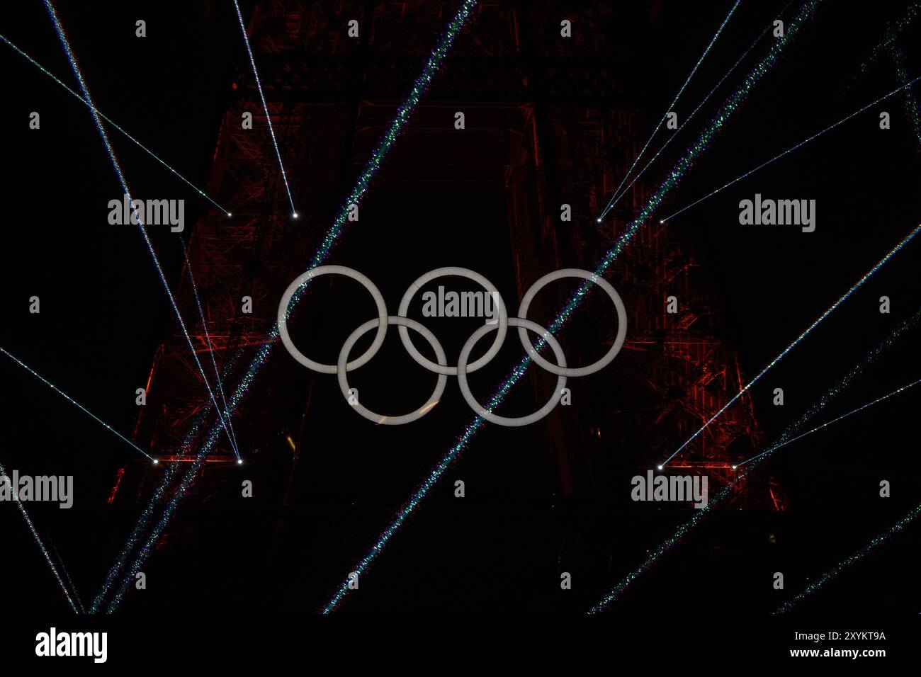 A crowd watches the opening ceremony of the 2024 Olympic Games on ...