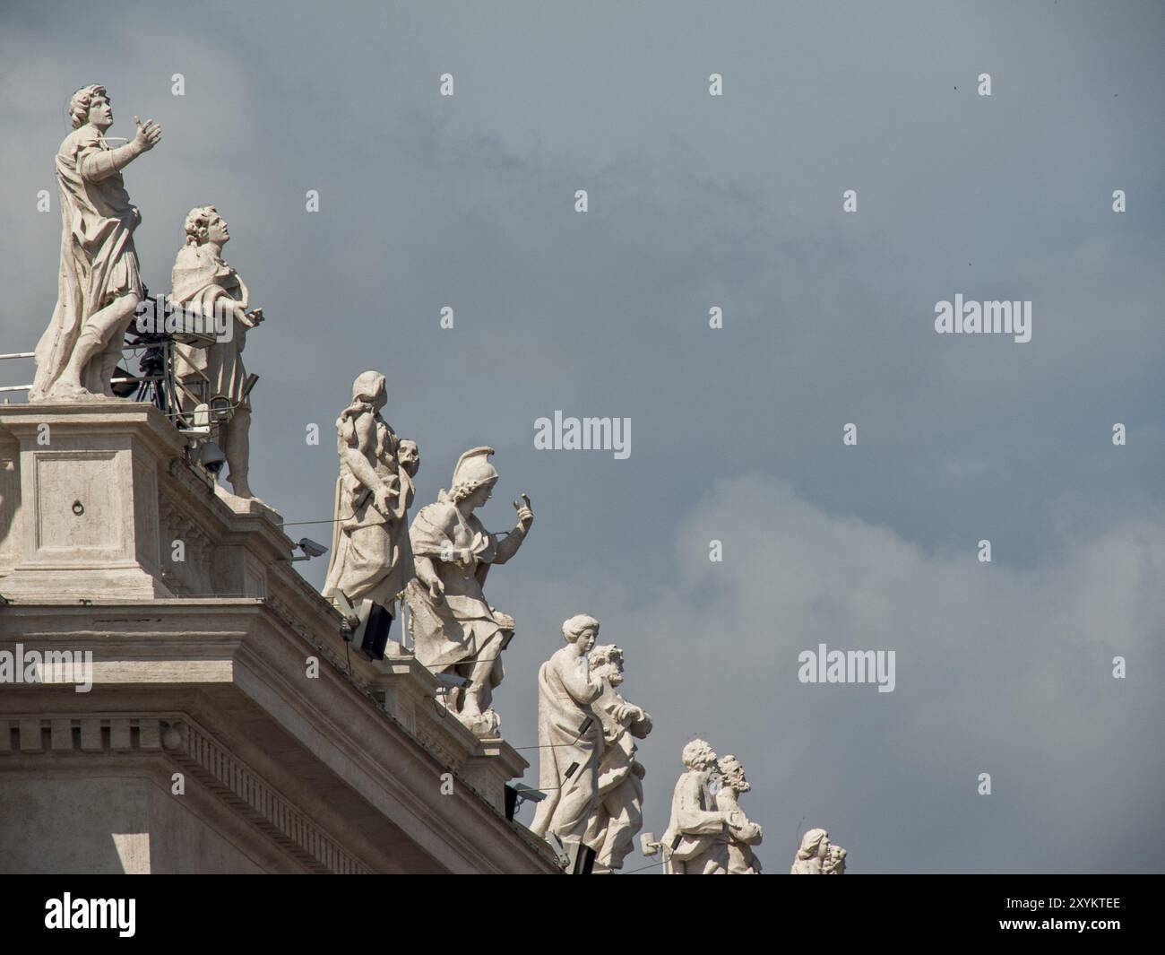 Detail of statues on the building, shown against a blue sky, baroque ...