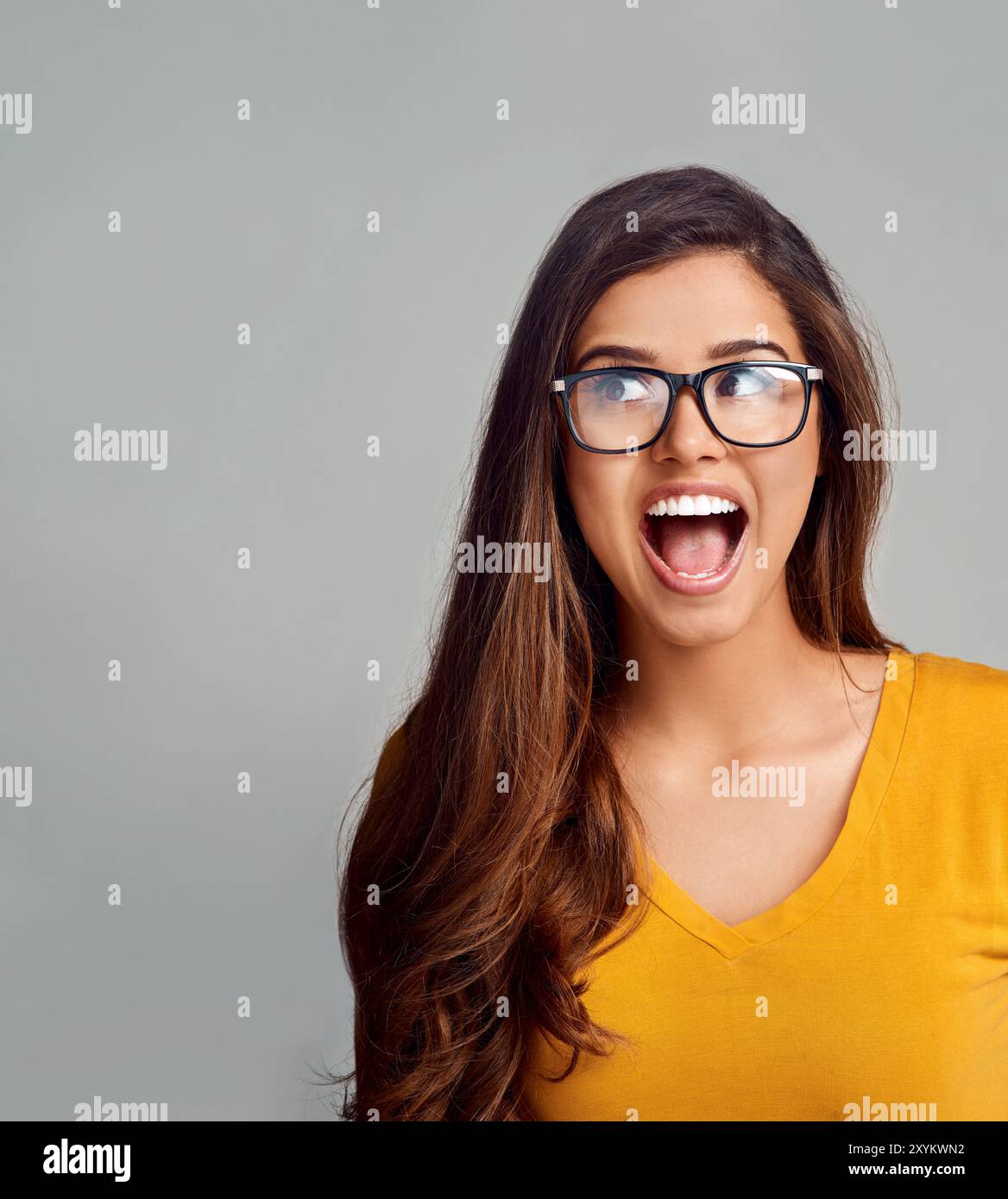 Woman, thinking and surprise in studio for idea, problem solving and ...