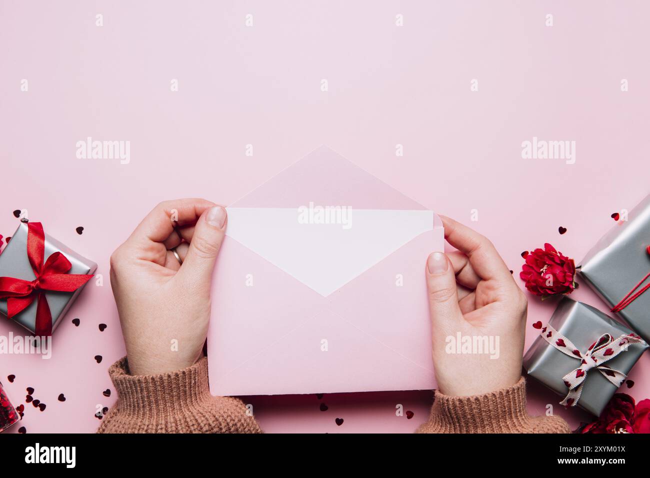 Female hands hold love letter empty message in open envelope, Valentine ...