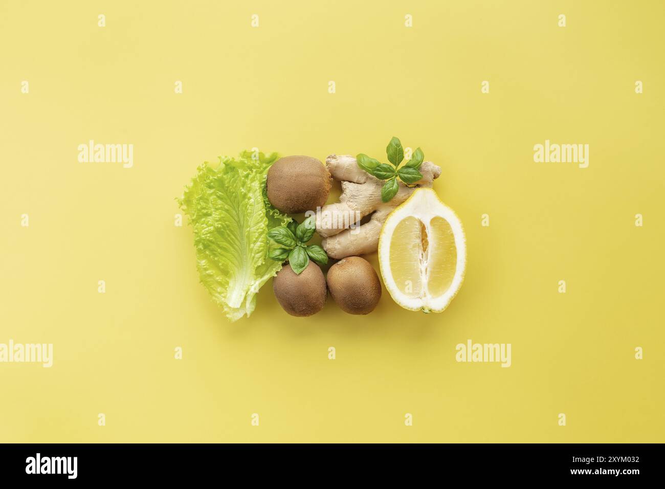 Healthy and organic food flay lay concept on yellow background. A ...