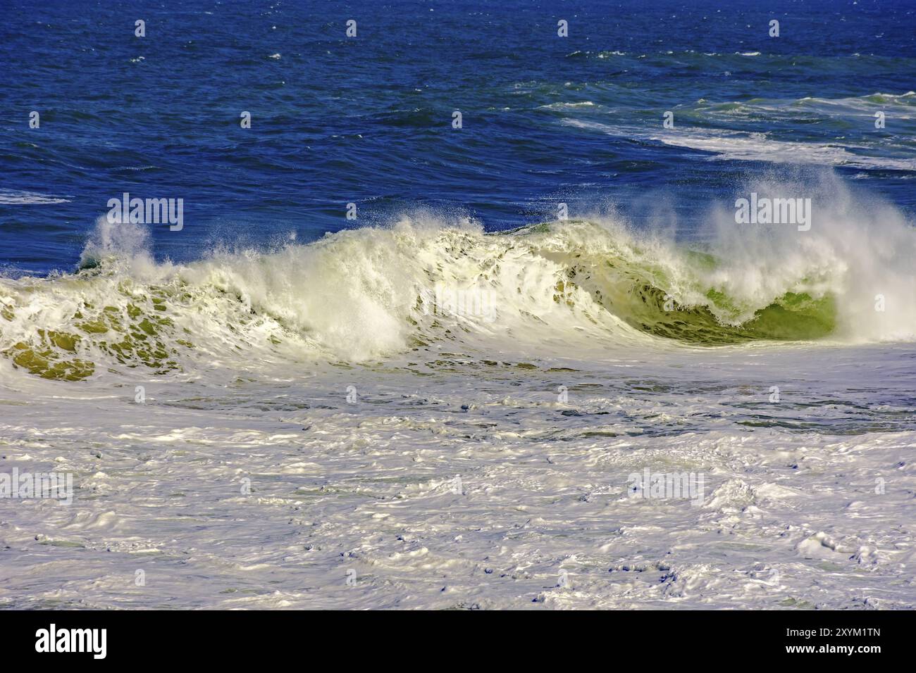 Big, dangerous waves during tropical storm in the green and blue waters ...