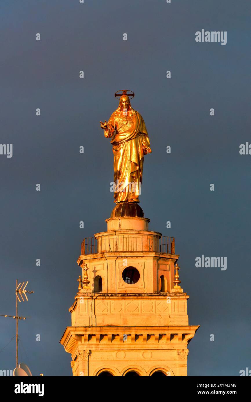 Statue of Christ the Redeemer atop the belltower of the Sacro Cuore di ...
