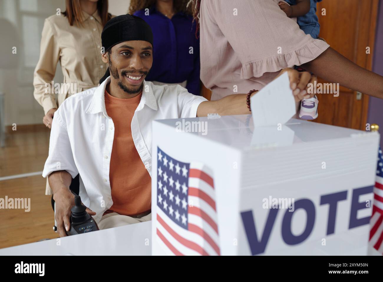 Woman putting vote paper hi-res stock photography and images - Alamy