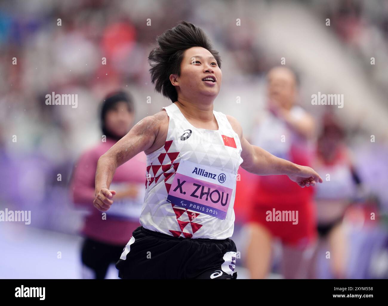 China's Xia Zhou wins the Women's 100m - T35 Final at the Stade de France on day two of the ...