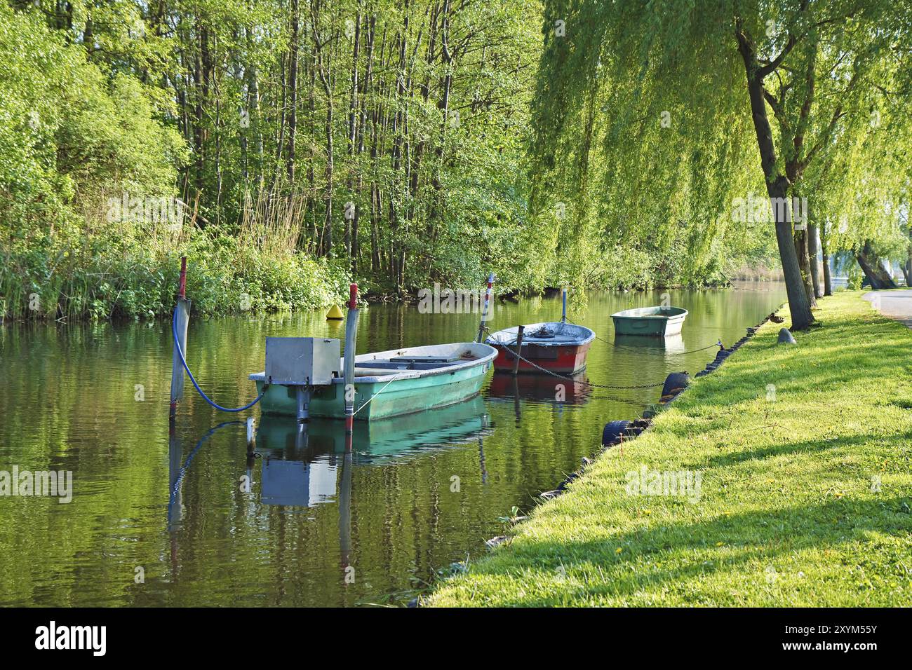 Boats on a river Stock Photo - Alamy