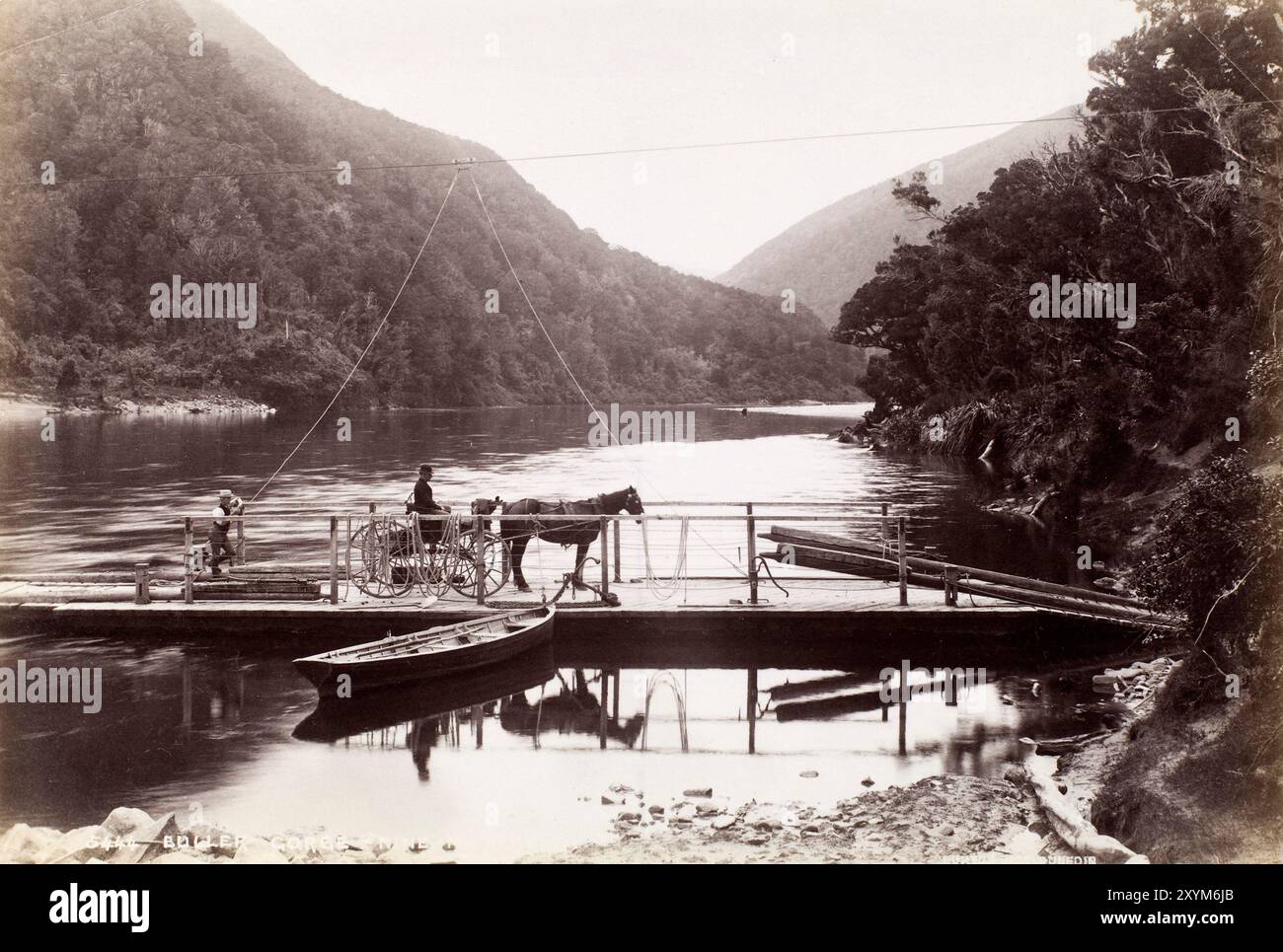 A ferry operatess on the Buller River near Westport, West Coast, South ...