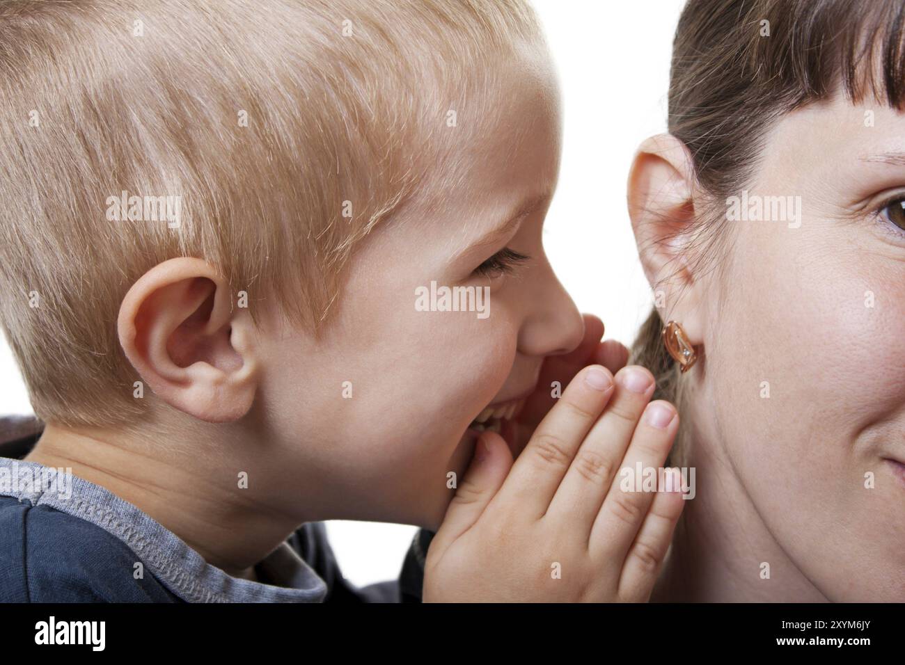 Little human child boy mother ear secrecy whisper Stock Photo - Alamy