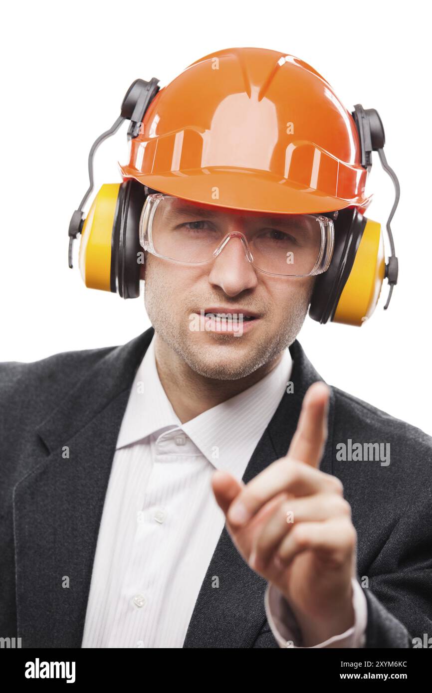 Businessman in black suit and safety hardhat helmet gesturing ...