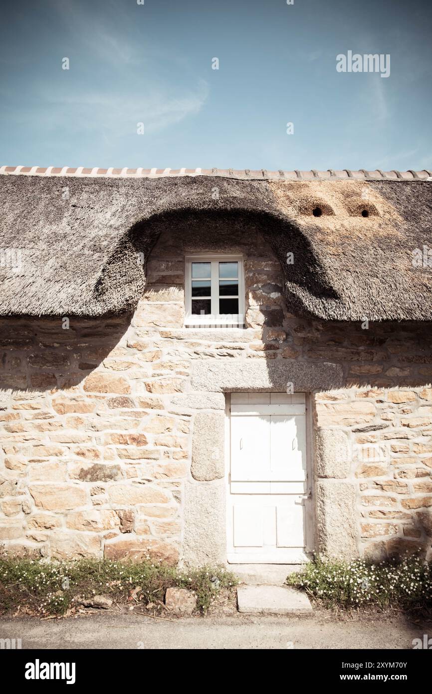 Detail of a traditional thatched roof cottage house in the charming ...