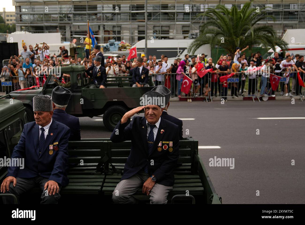 People watch Turkey's Forces officers parade for Victory Day, in ...