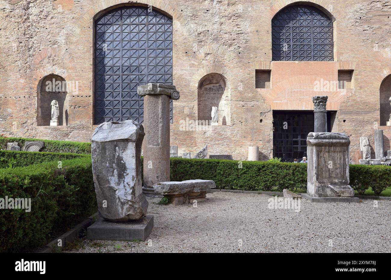 Roman artefacts and the thermal bath wall Stock Photo - Alamy