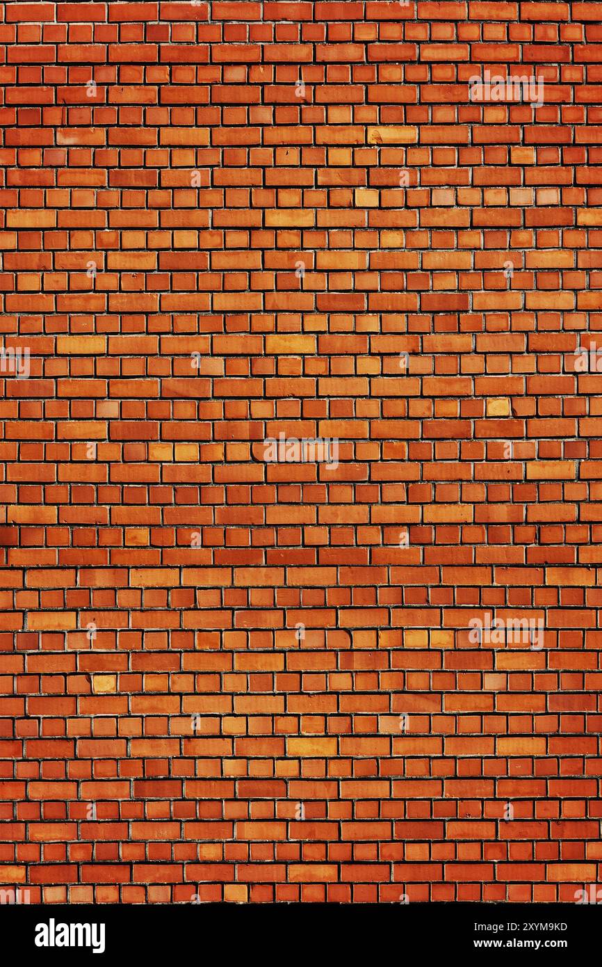 Orange brick wall background Stock Photo - Alamy