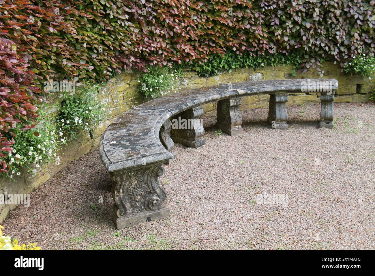 A Long Circular Vintage Stone Garden Bench Seat Stock Photo - Alamy