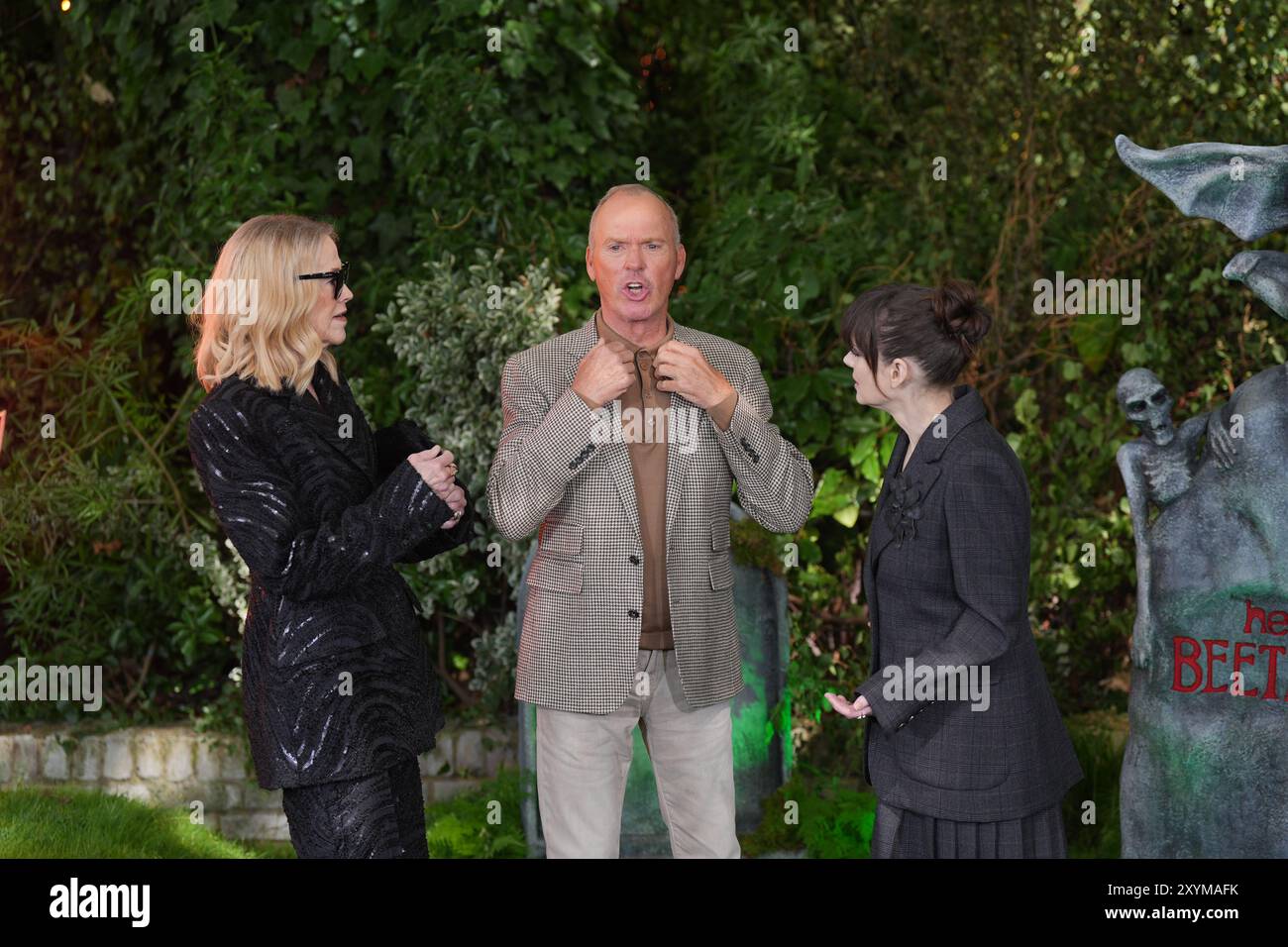 (left-right) Catherine O'Hara, Michael Keaton and Winona Ryder ...