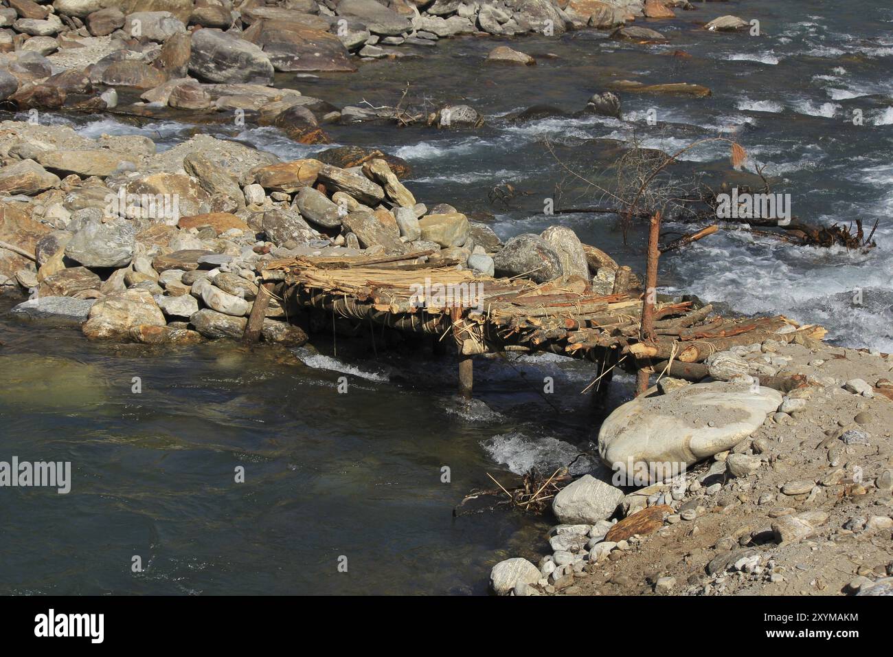 Timber bridge and Langtang Khola, river in Nepal Stock Photo - Alamy