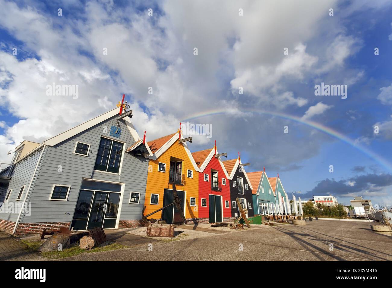 Rainbow over buildings in hi-res stock photography and images - Alamy