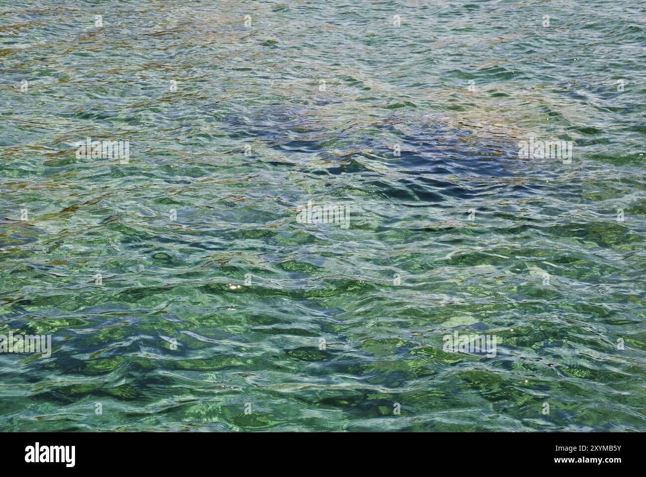 Ocean with rock background Stock Photo - Alamy