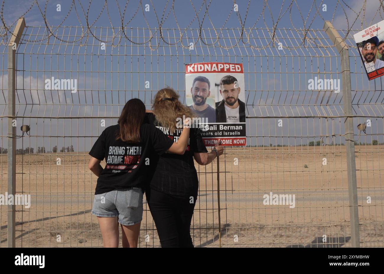 NIRIM, ISRAEL - AUGUST 29: Relatives of the 26-year-old twins, Ziv and ...