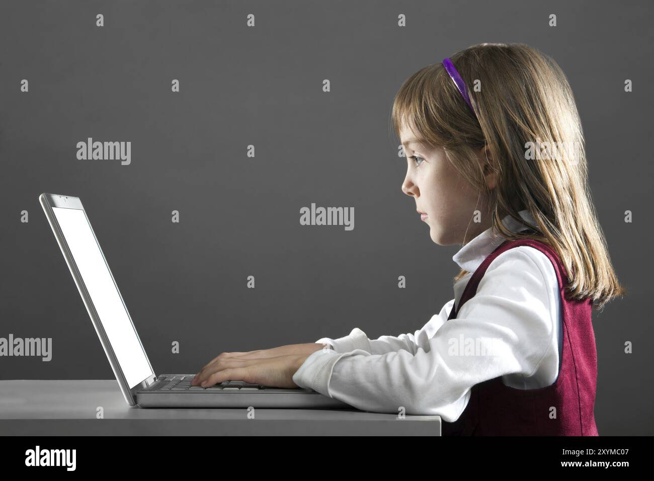 School girl working computer hi-res stock photography and images - Alamy