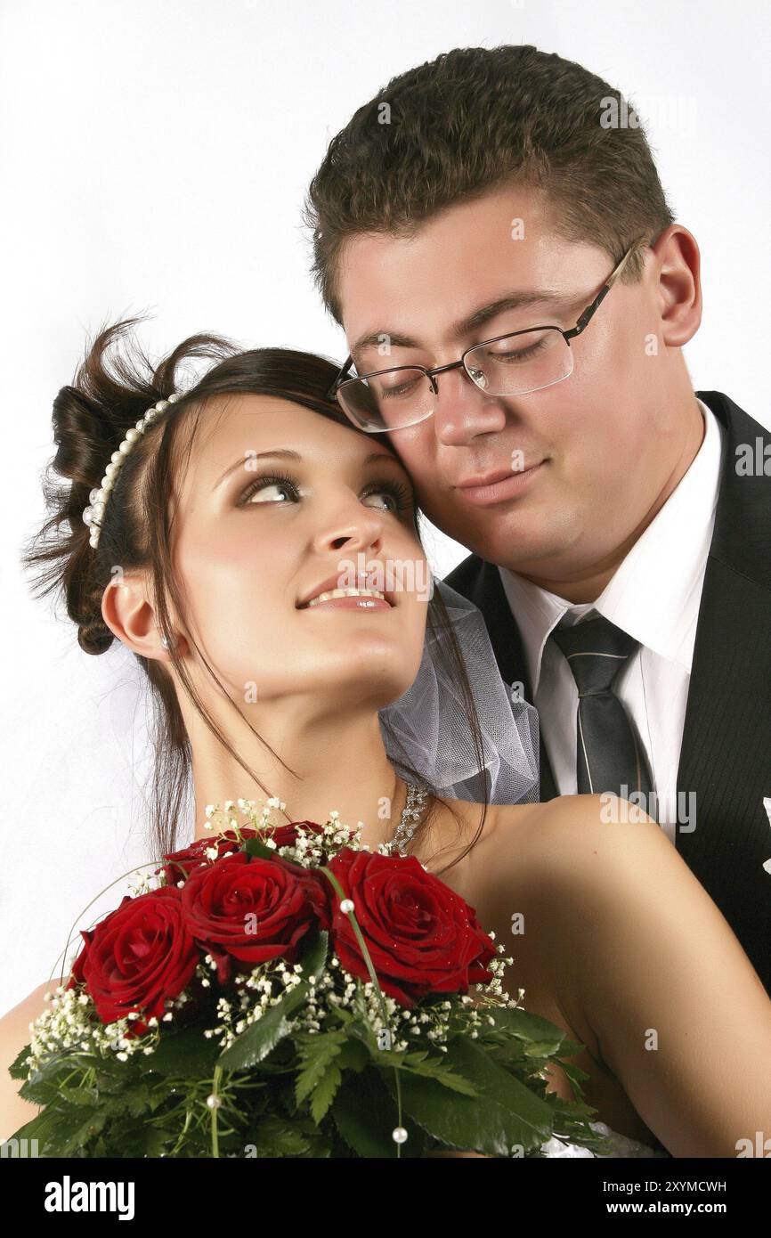 Newly married together in a photo pose Stock Photo - Alamy