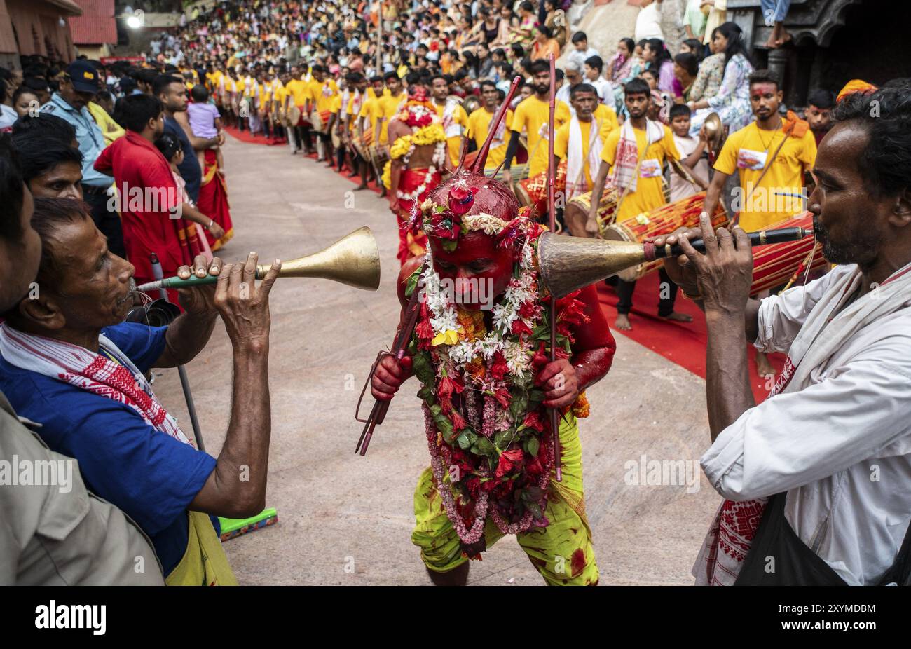 GUWAHATI, INDIA, AUGUST 19: Priests dance in the beat of Dhol (Drum ...