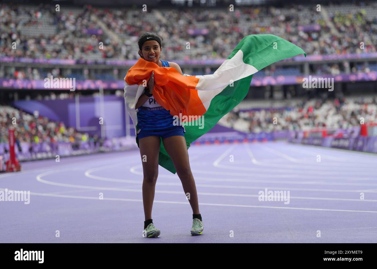 August 30 2024: Preethi Pal of India celebrates winning bronze in Women ...