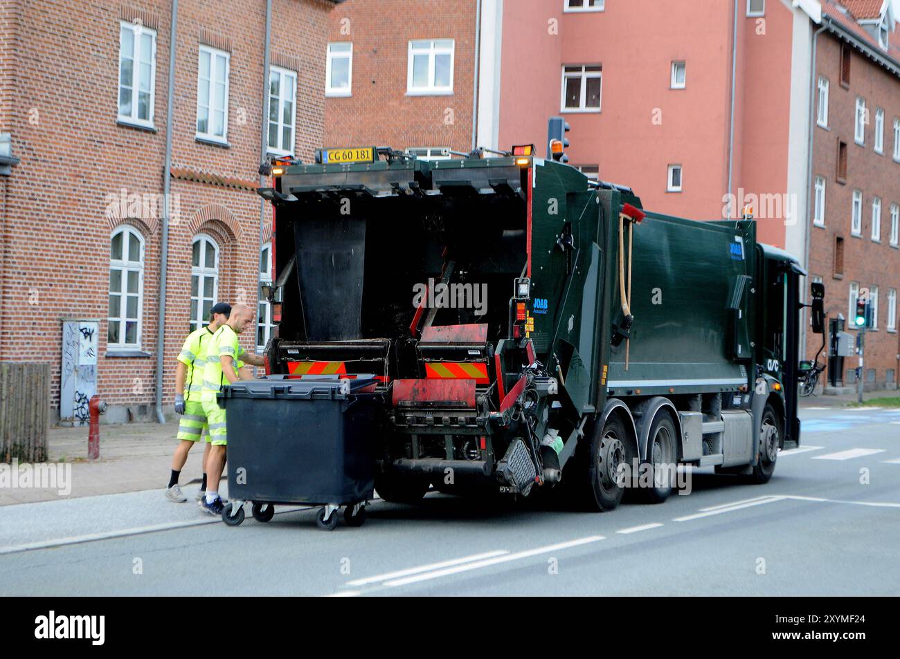 Copenhagen/ DenmarK/30 August 2024/Person collecting waste for ...