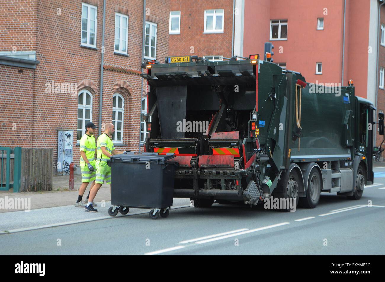 Copenhagen/ DenmarK/30 August 2024/Person collecting waste for ...