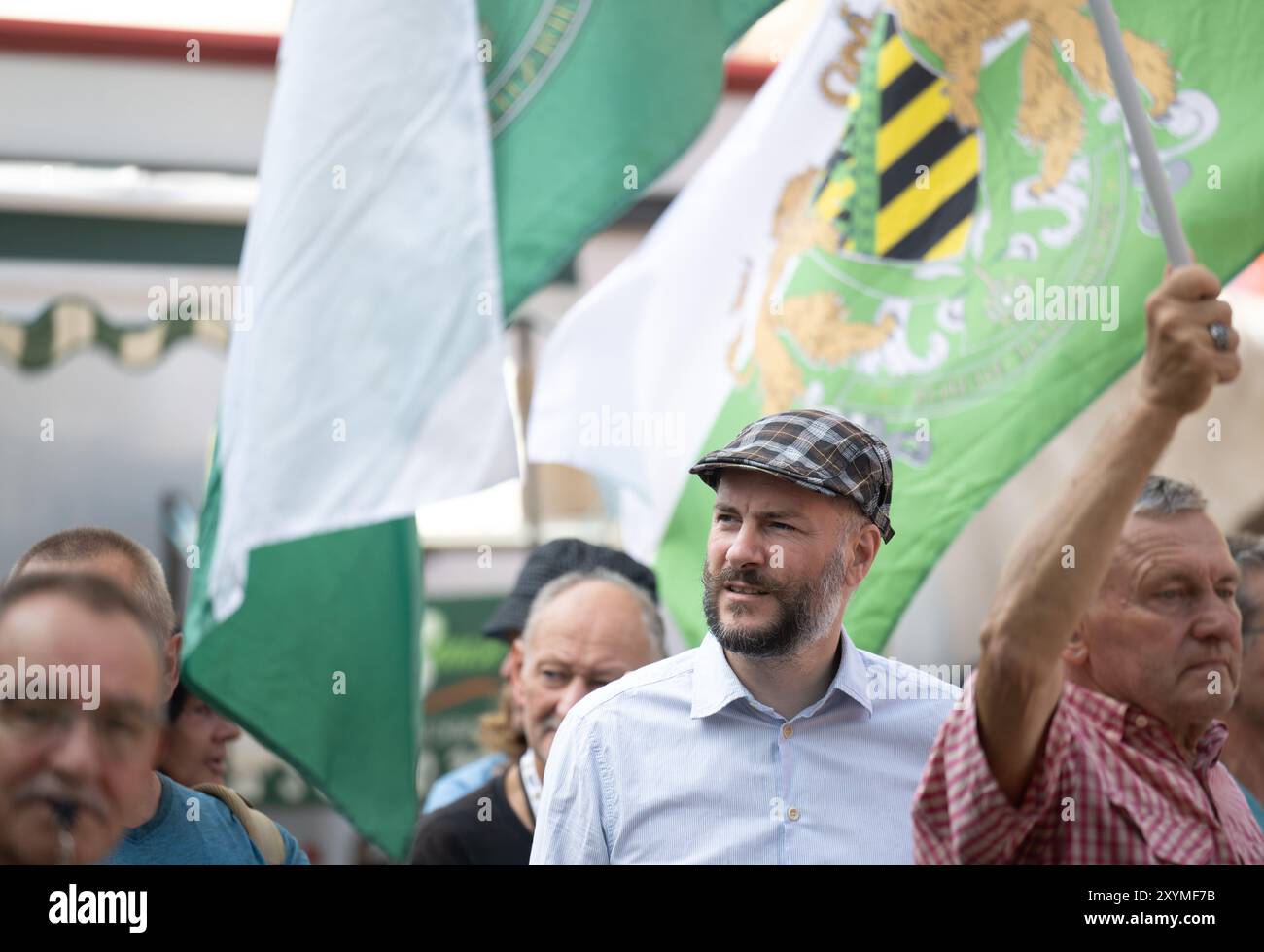 Chemnitz, Germany. 30th Aug, 2024. Martin Kohlmann (2nd from right ...