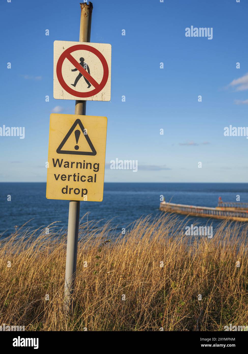 Sign: Warning vertical drop, seen in Whitby, North Yorkshire, England ...