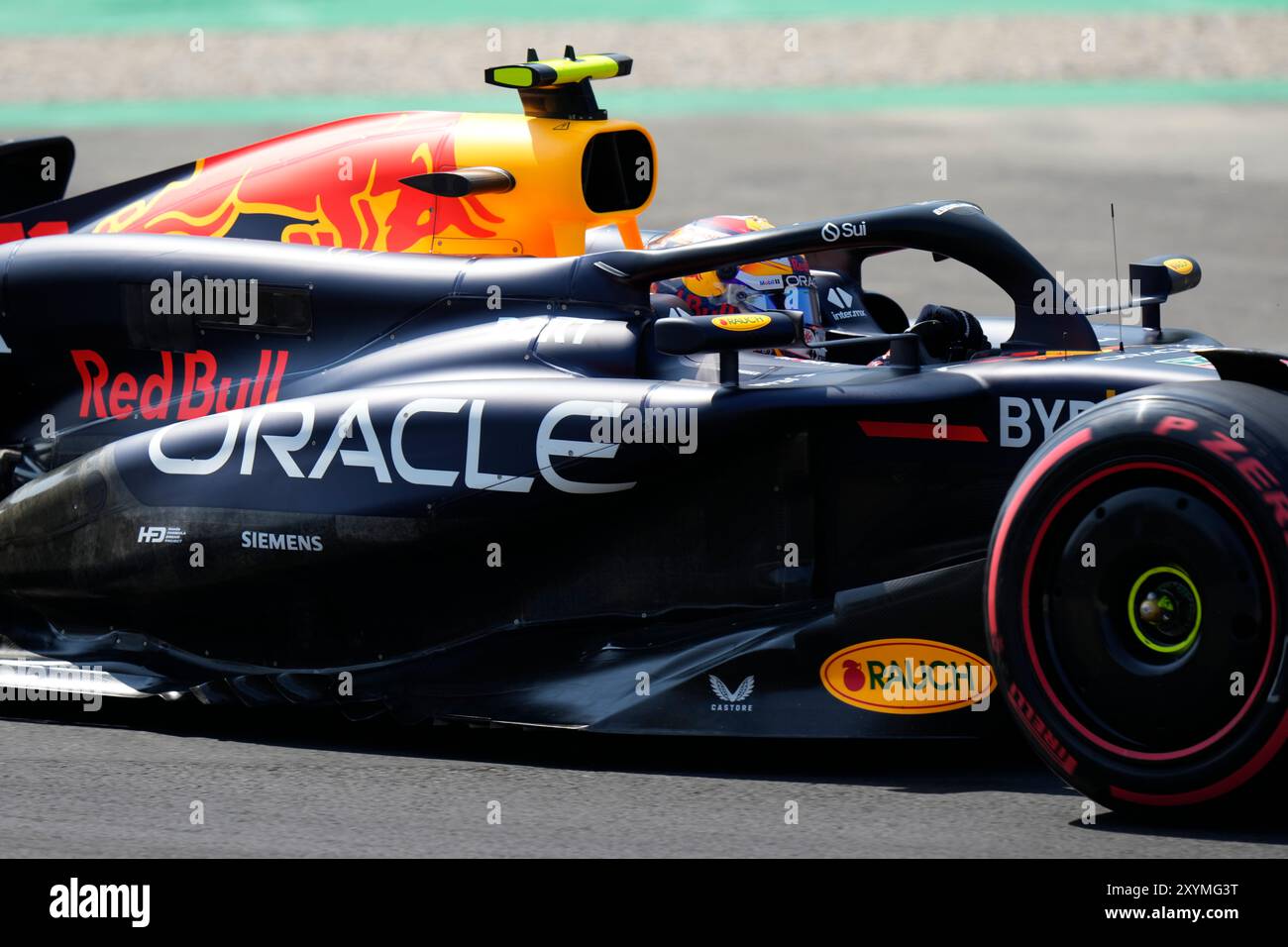 Red Bull driver Sergio Perez of Mexico steers his car during the first free practice ahead of ...
