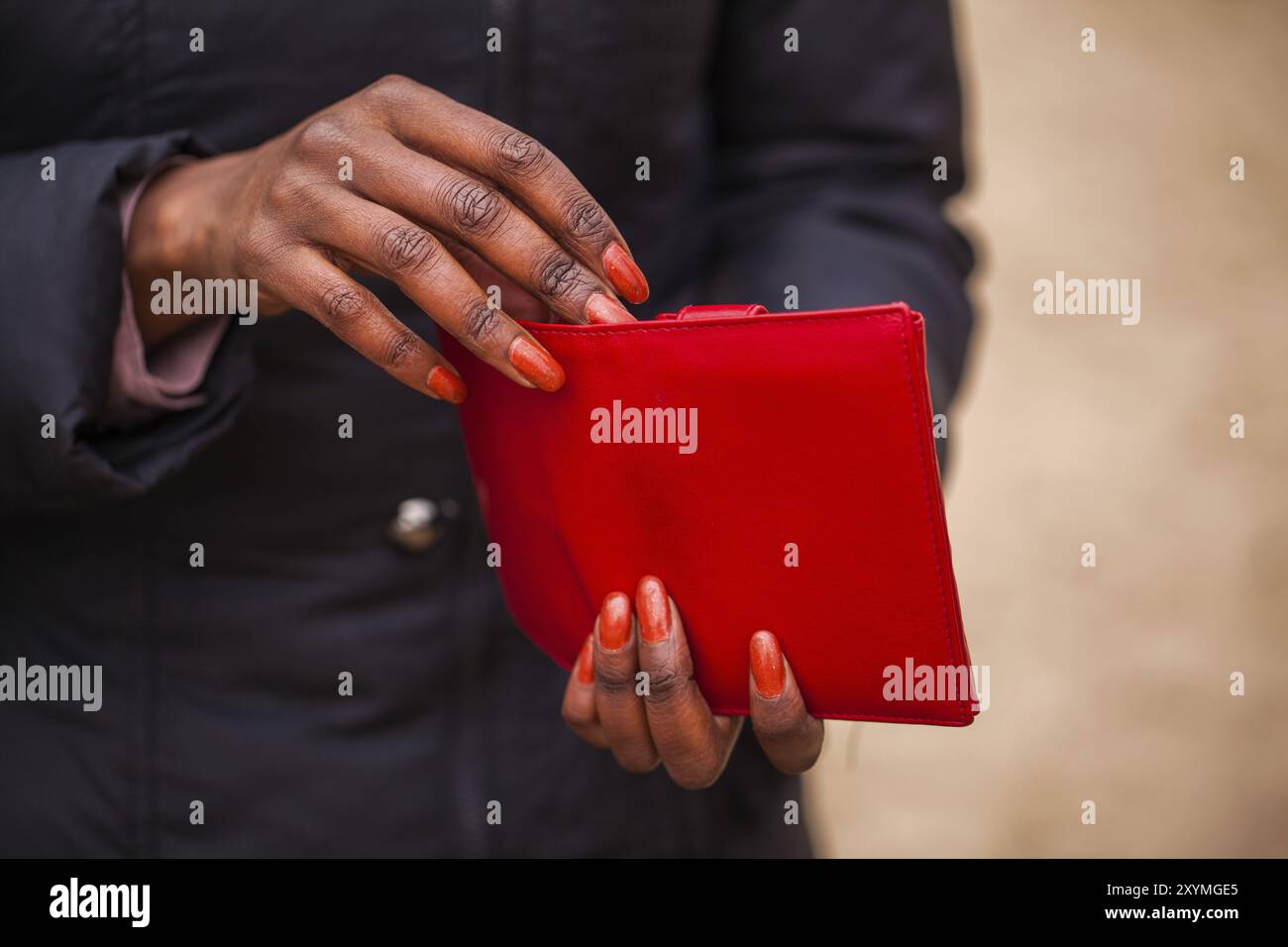 Hand over purse hi-res stock photography and images - Alamy
