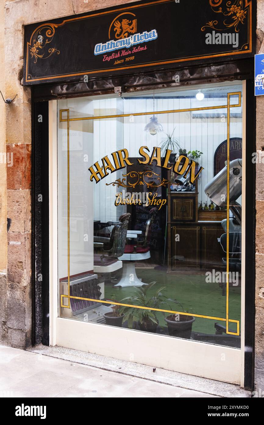 Old-fashioned hairdresser in the historic centre of Barcelona, Spain ...